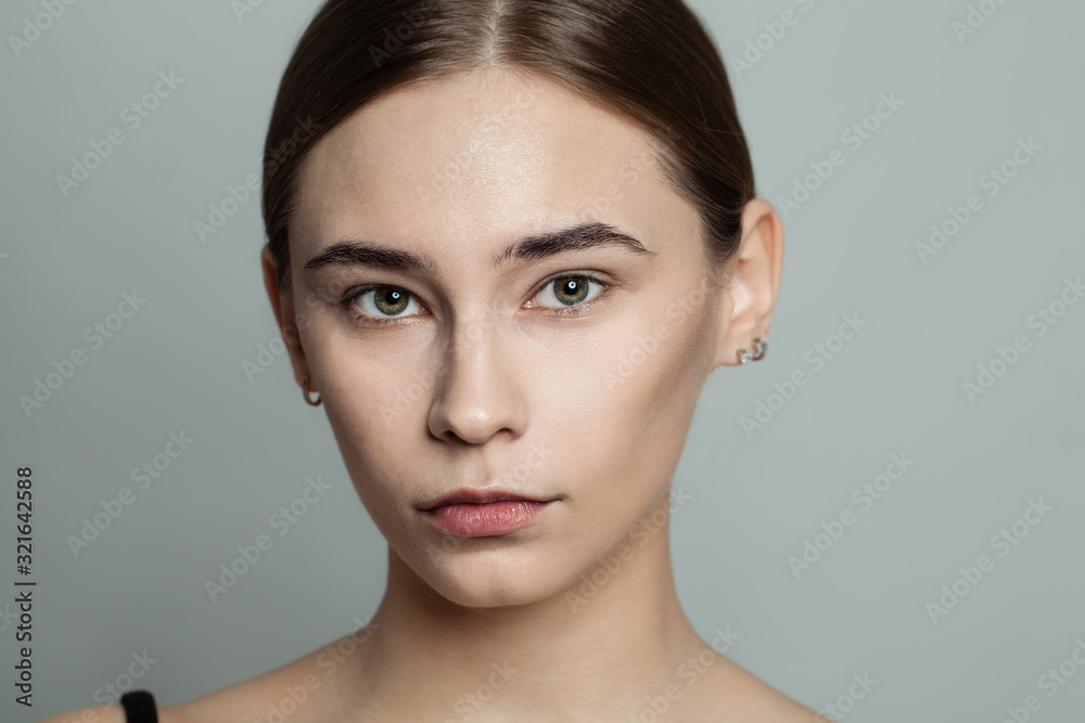 Young beautiful woman without makeup cosmetics portrait. Face closeup ...