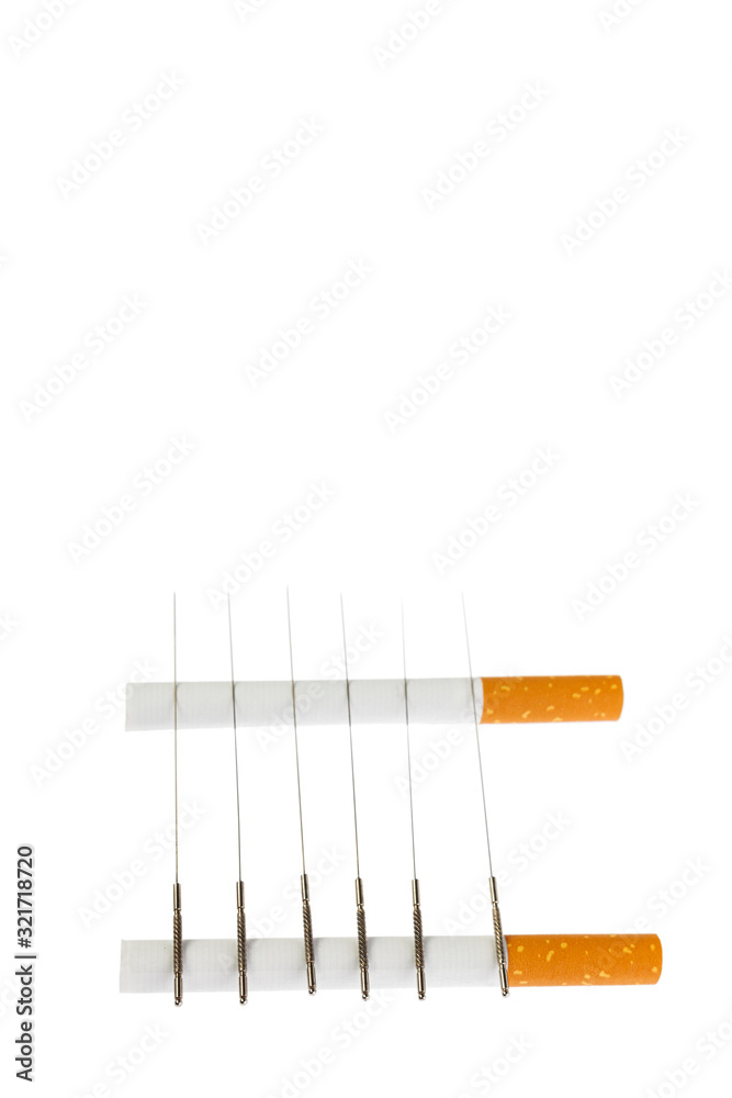 Acupuncture to stop smoking. Voodoo cigarettes. Acupuncture needles are ...