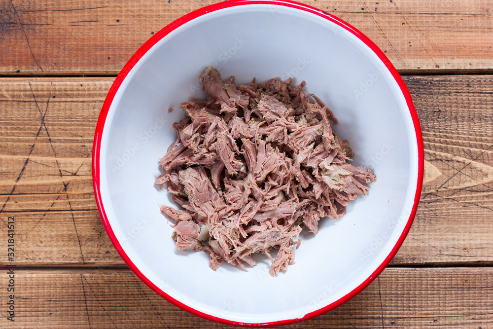 Stock-Foto „Step-by-step preparation of salad with boiled beef and egg ...