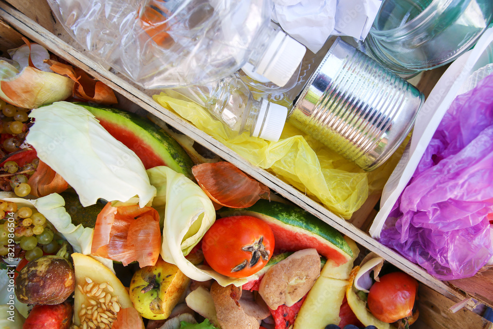 Different trash. Garbage sorting: iron, paper, plastic, domestic waste ...