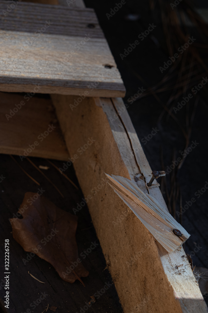 Exposed nails of a pallet while being broken down for use in various ...
