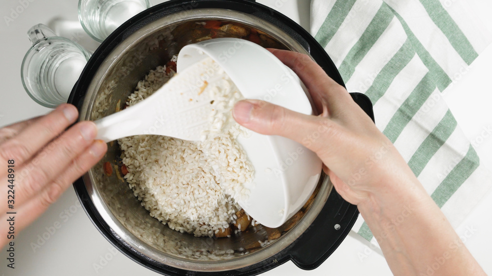 Cooking rice with meat and vegetables in pressure multi cooker step by ...