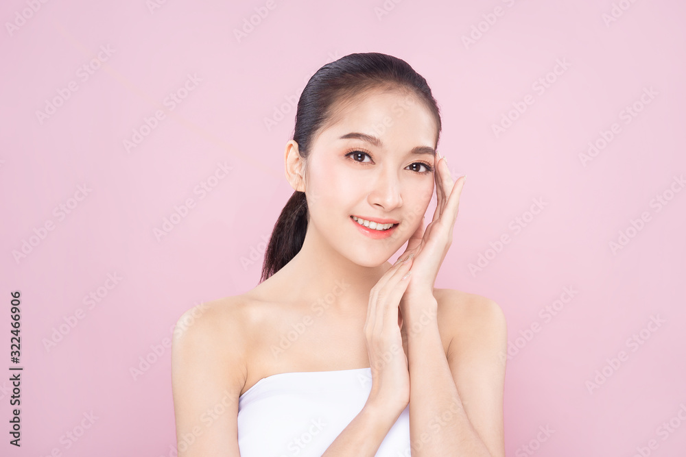 Beautiful Young Asian woman with clean fresh white skin touching her ...