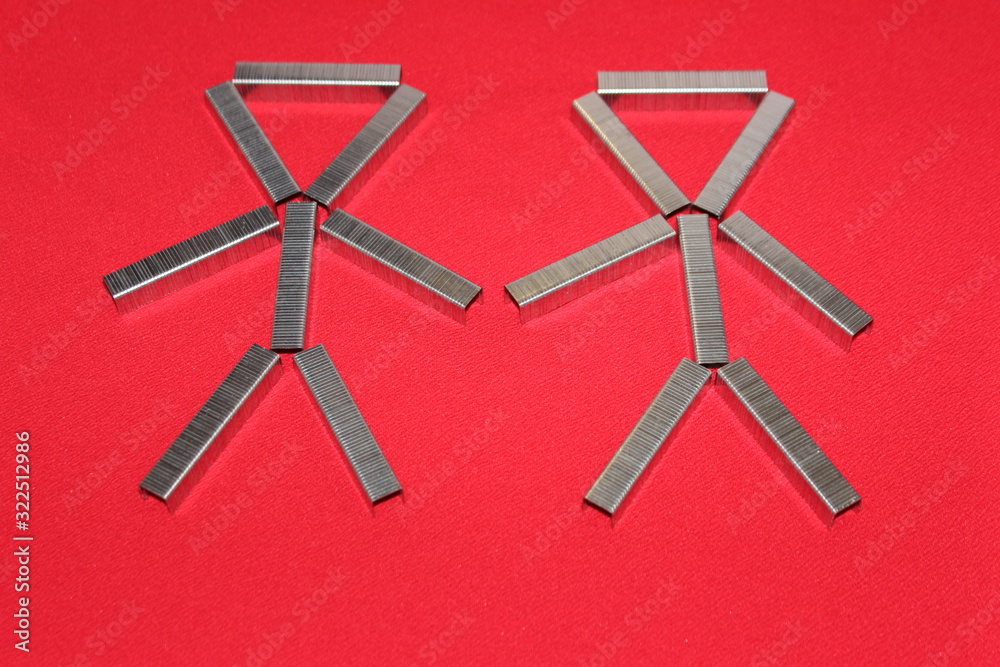 A man laid out of staples for a stapler. Figure from brackets on a ...