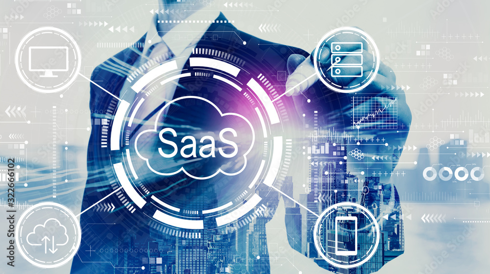 SaaS - software as a service concept with businessman on a city ...