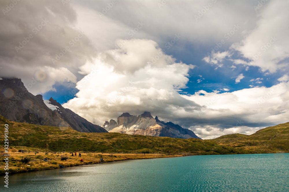 Panorama view from lake Pehoe on mountain peaks Cerro Paine Grande and ...