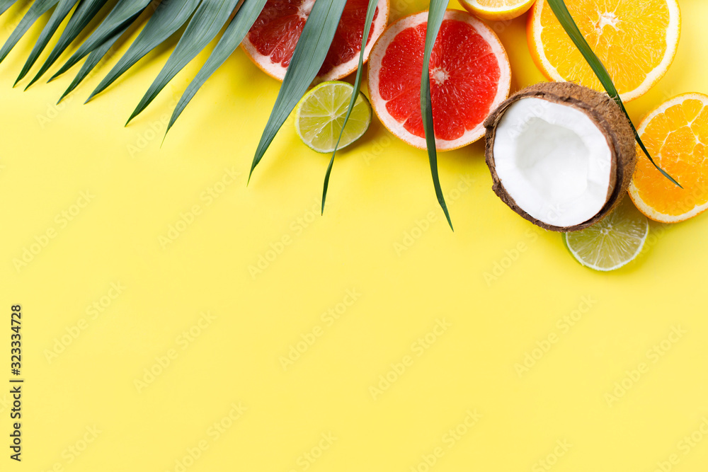 Summer vibes. Composition with exotic fruits on bright yellow ...