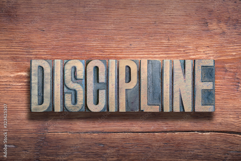 discipline word wood Stock Photo | Adobe Stock