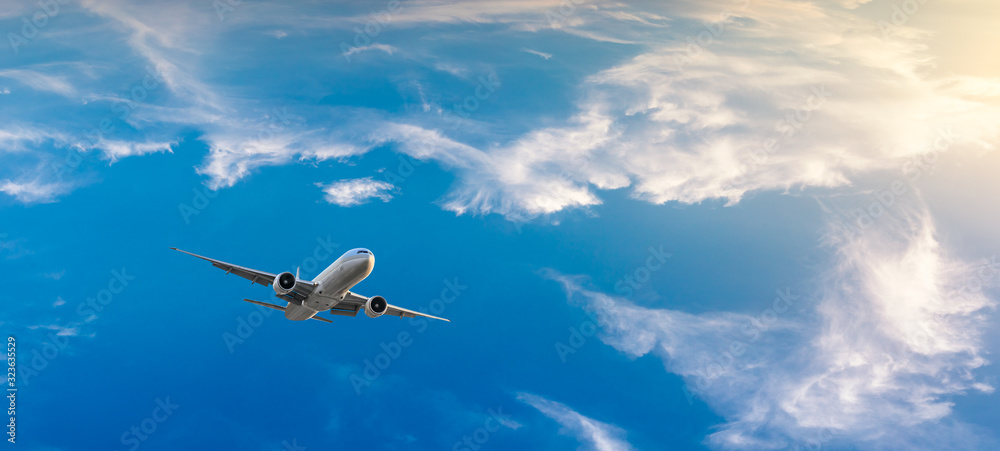 High-altitude airplane and beautiful sky in spring Stock Photo | Adobe ...