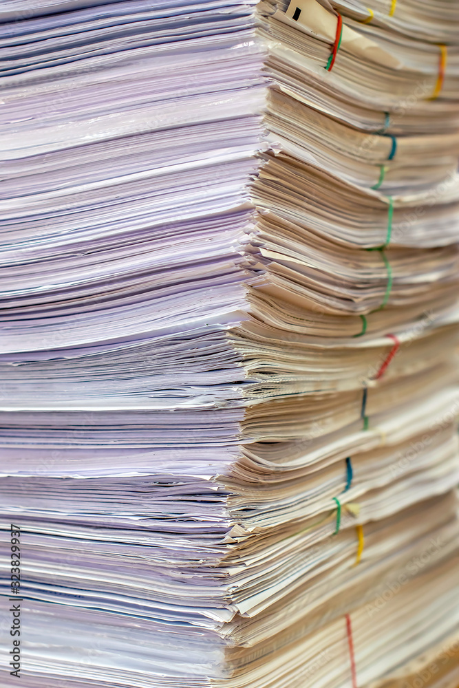 Foto bundles bales of paper documents. stacks packs pile on the desk in ...