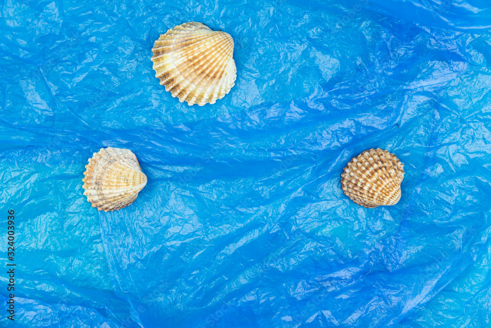 Foto de Stock Plastic pollution in ocean concept. Carrier bags in sea ...