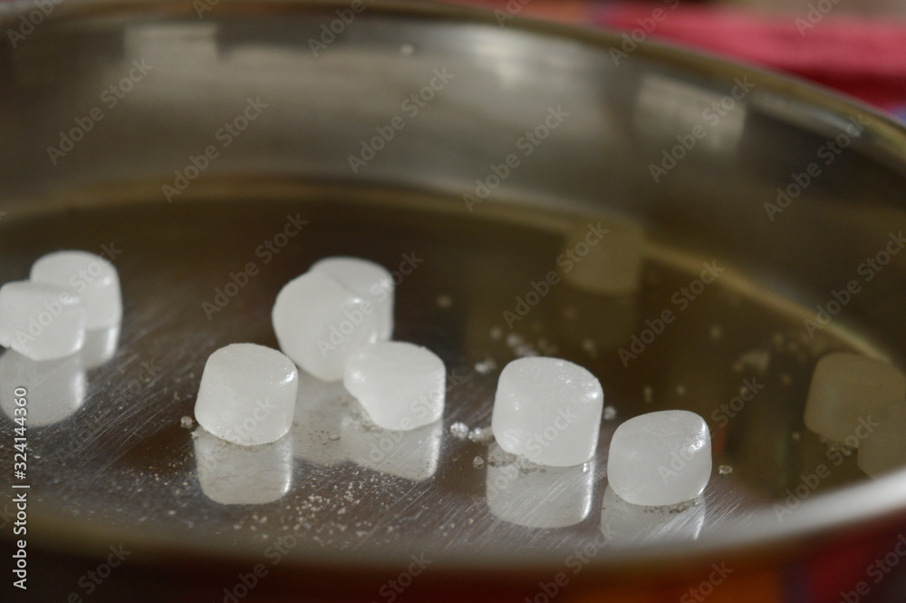 Sublimation , Camphor in Metal dish. Stock Photo | Adobe Stock