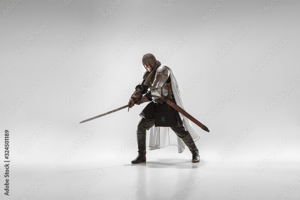 Brave armored knight with professional weapon fighting isolated on ...