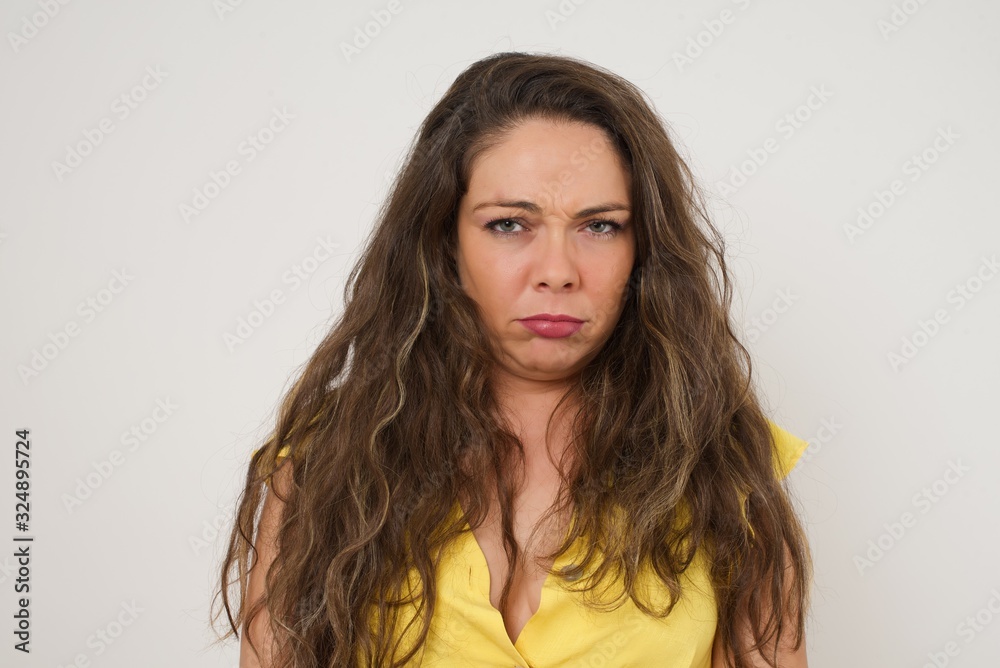 Beautiful face of sad woman crying desperate and depressed with tears ...