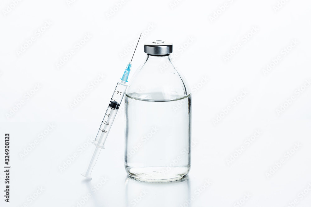 Vaccination kit. Antibiotics in glass bottles, saline solution for drug ...