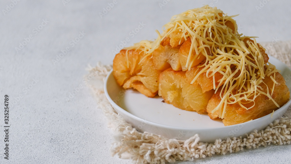 Deep fried cassava root. Brazilian Mandioca Frita (deep fried cassava ...