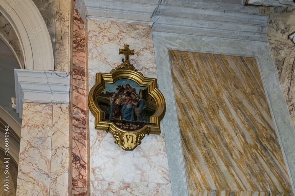 Bas-relief symbolizing the 6th stop of Jesus Christ on the wall in the ...