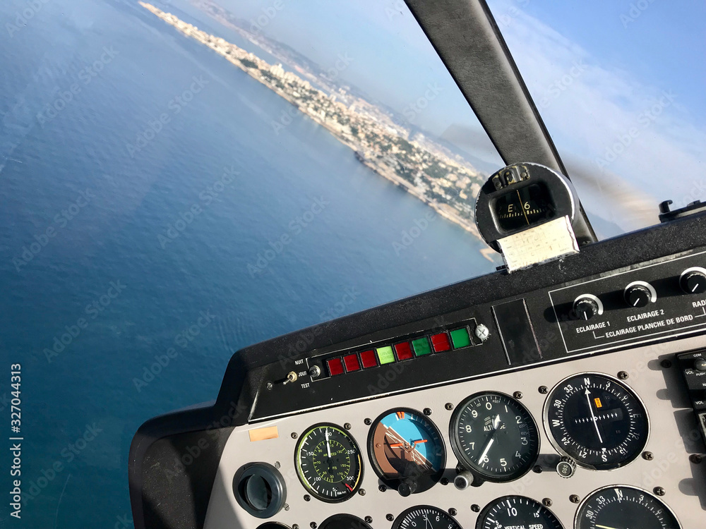 Inside the cockpit of a small airplane having fun above the sea with ...