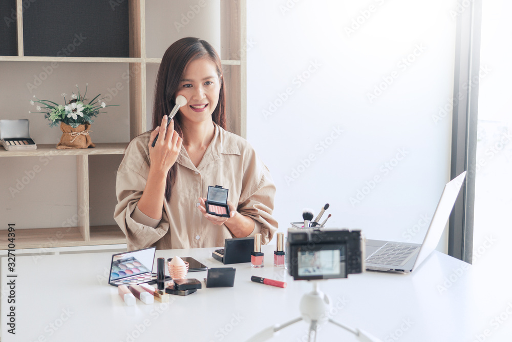 Makeup Beauty fashion blogger recording video presenting makeup ...