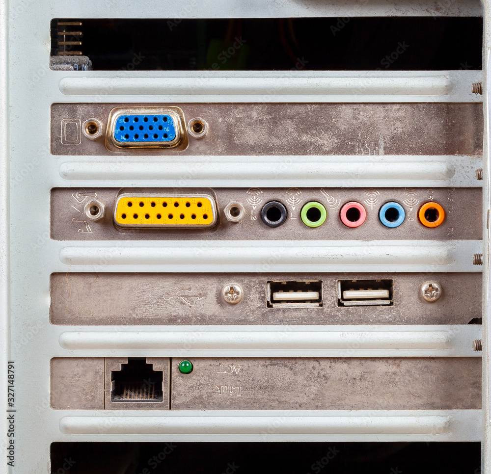 Fotografie Old retro obsolete PC case back, expansion slots, backside ...