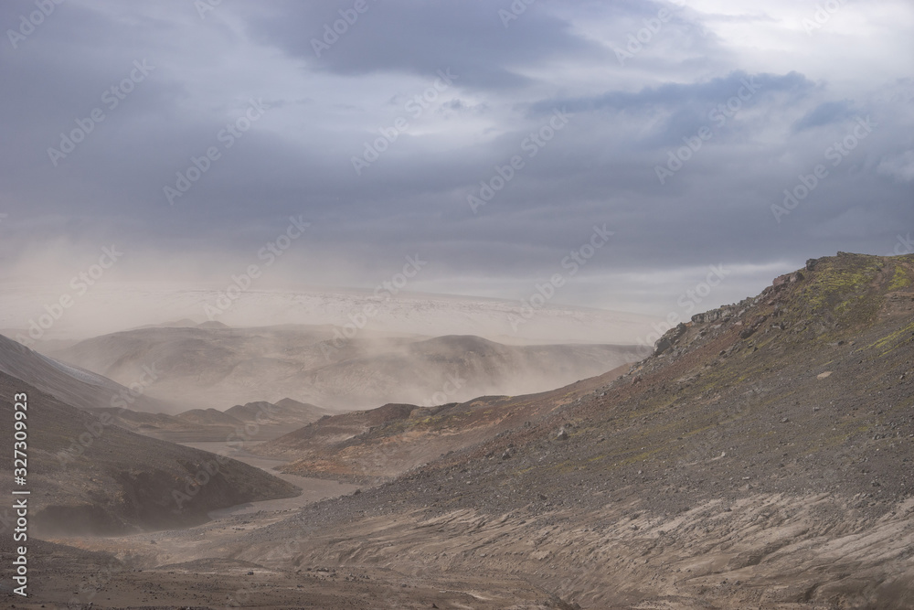 Volcanic landscape during ash storm on the Fimmvorduhals hiking trail ...