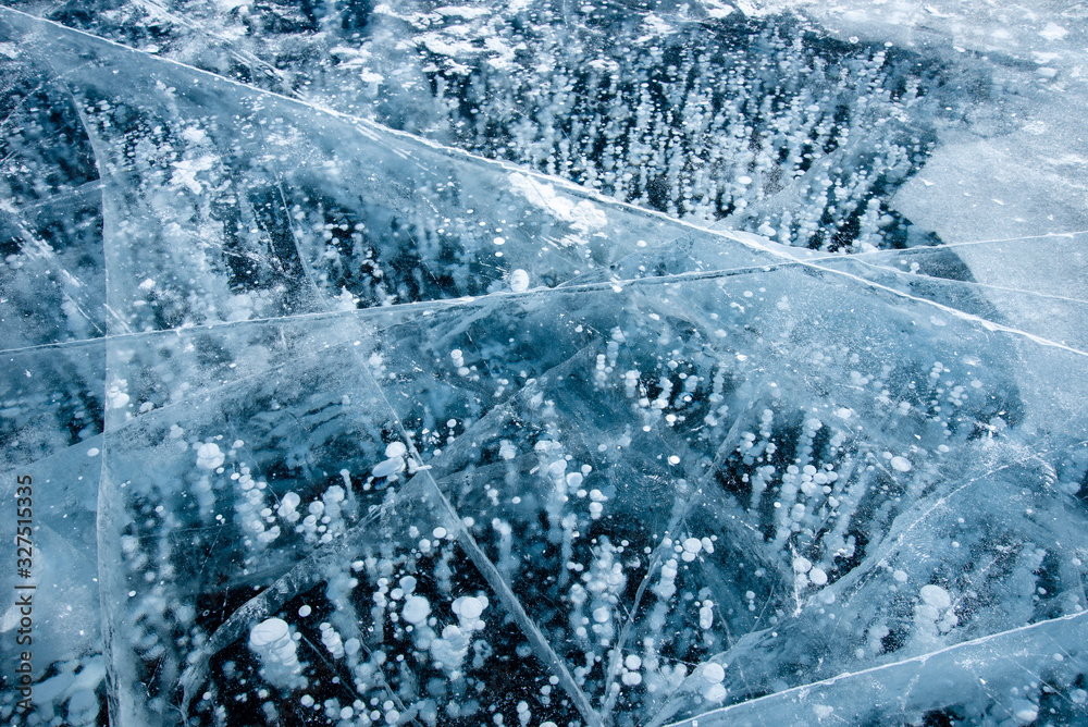 Methane Bubbles in the Baikal Ice.ice and cracks on the surface of Lake ...