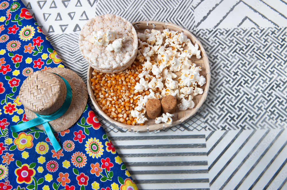 Sieve with corn, popcorn, straw hat, sweet kid's feet, traditional in ...