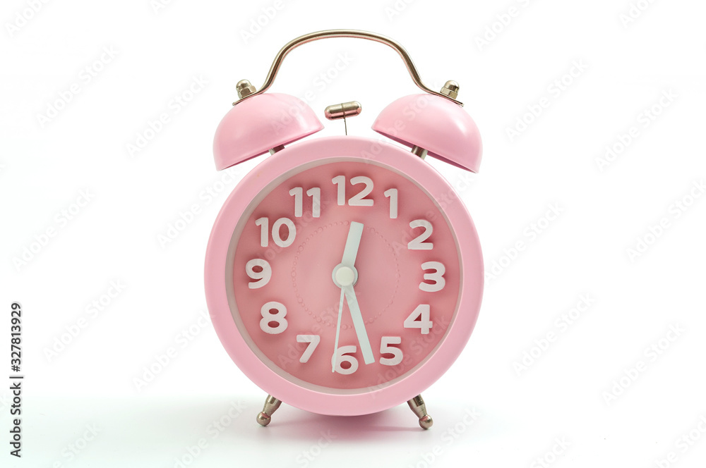 Sleep hygiene, wake up ring and old fashioned clocks concept with pink ...
