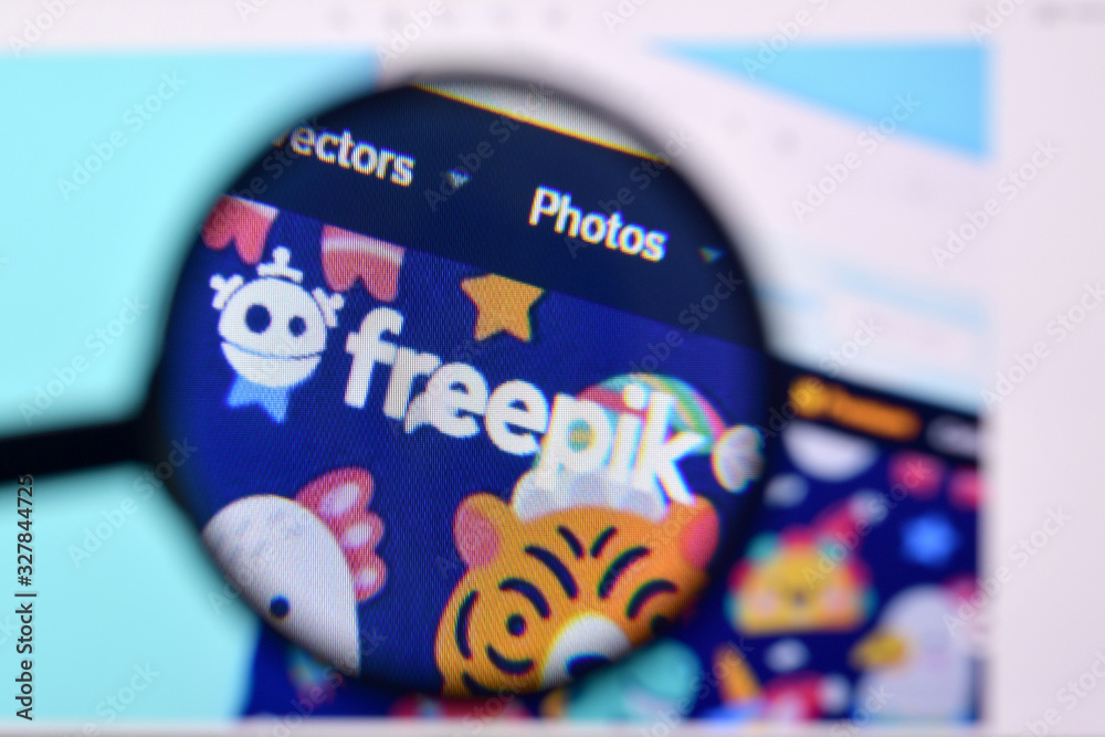 Homepage of freepik website on the display of PC, url - freepik.com ...