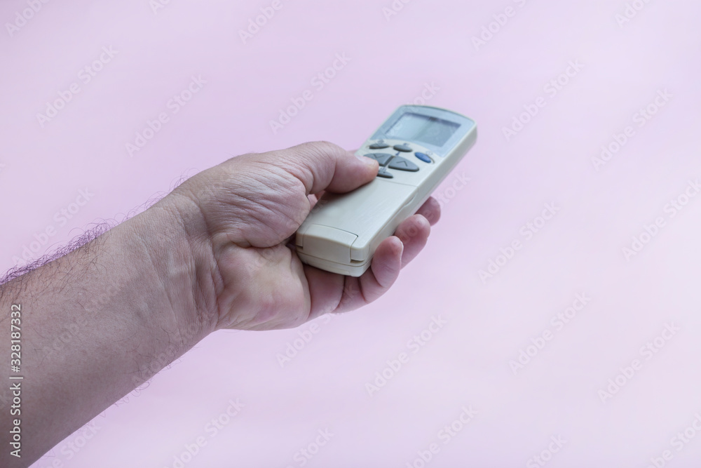 hand holding remote control isolated on white background Stock Photo ...