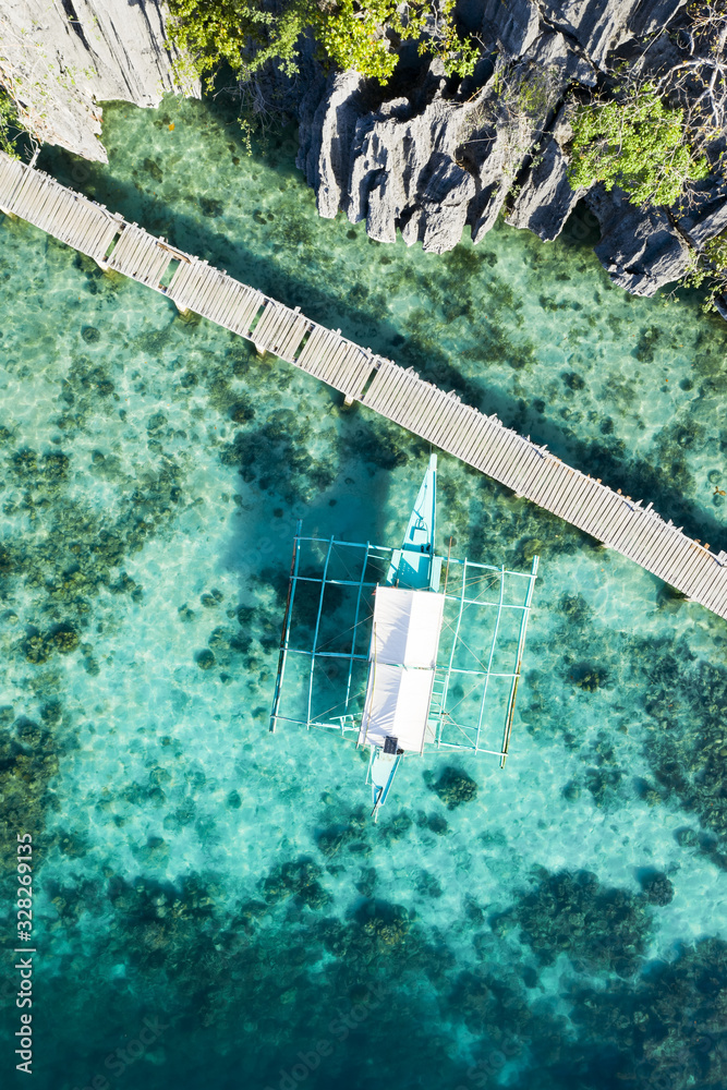 View from above, stunning aerial view of a Bangka floating on a ...