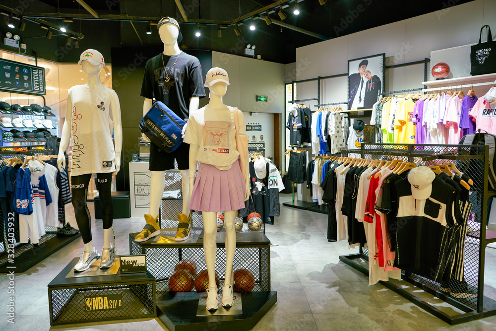 SHENZHEN, CHINA - CIRCA APRIL, 2019: clothes on display at NBA Style ...
