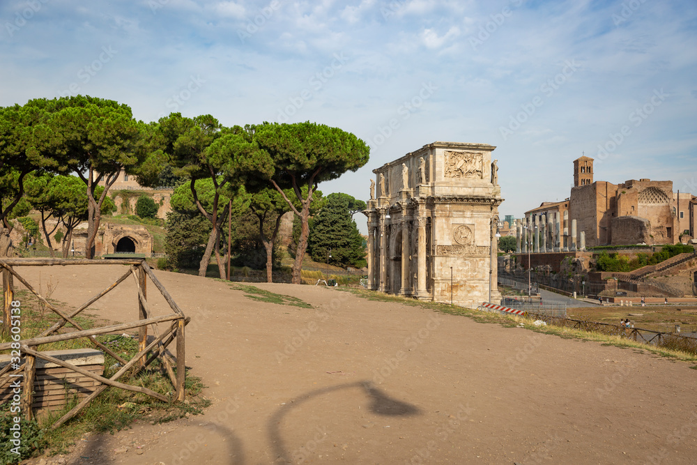 side view of the Arch of Constantine (Arco di Costantino) between the ...