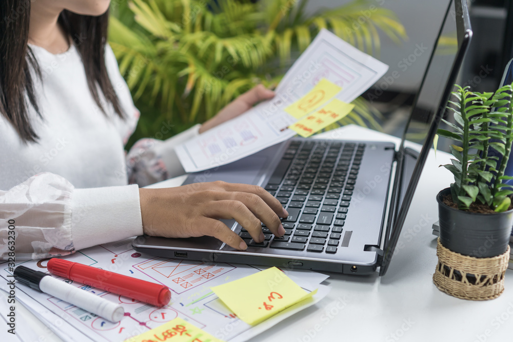 Website development startup asian designer planning wireframe mobile ...