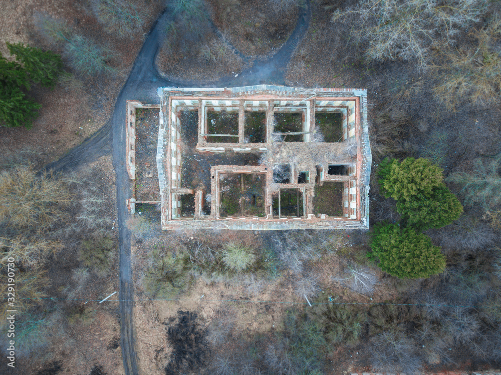 Aerial view of the old abandoned brick building without roof, looks ...