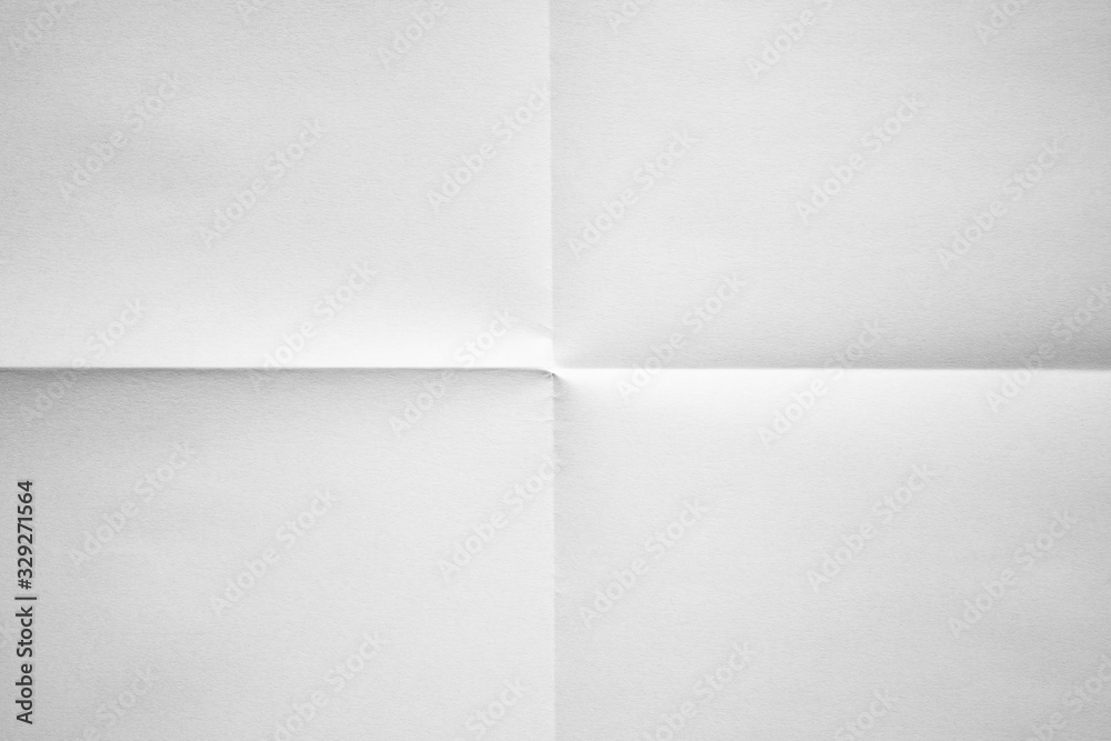 White paper folded in four fraction background 스톡 사진 | Adobe Stock