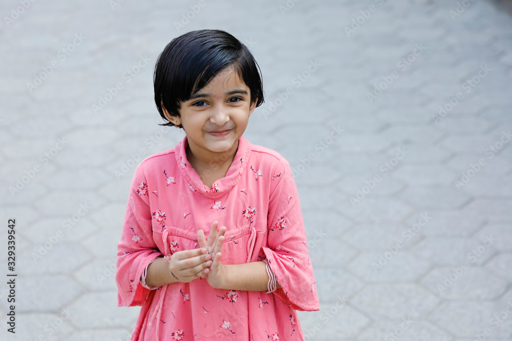 cute indian little girl smiling and showing expression Stock Photo ...