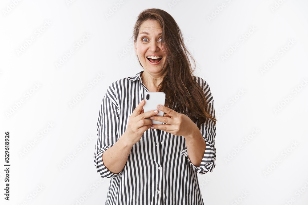 Stock-Foto „Amused, amazed charismatic middle-aged 50s woman with ...
