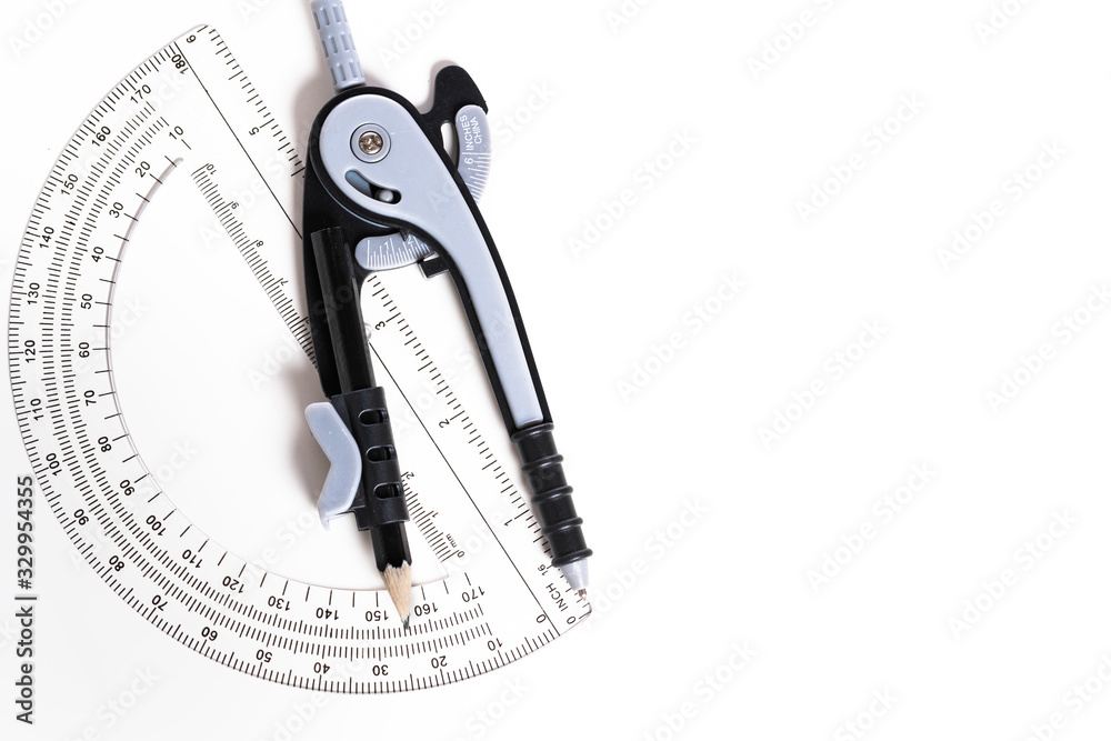 Compass and protractor on a white background Stock Photo | Adobe Stock