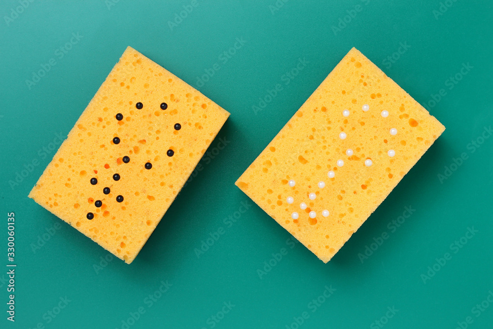 Abstract signs of man and woman made by needles in sponges for washing ...