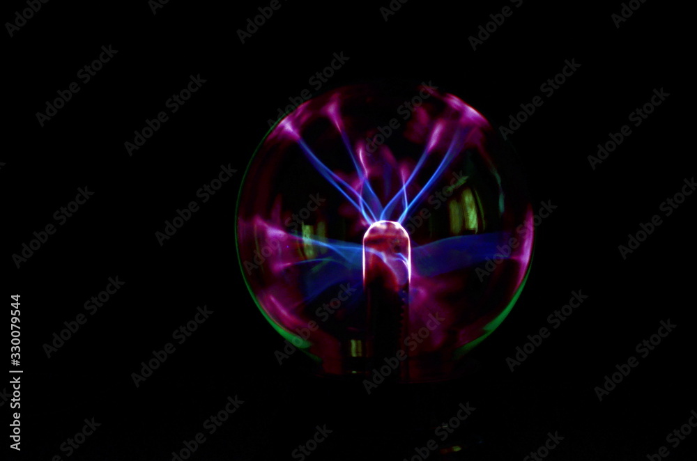 Plasma ball Static Electricity light on black background. lighting on ...