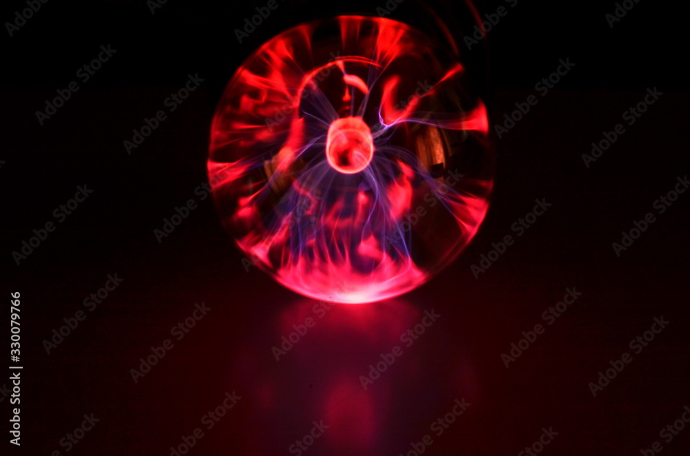 Plasma ball Static Electricity light on black background. lighting on ...