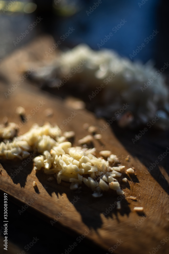 Mise en place - chopped onion garlic Stock Photo | Adobe Stock