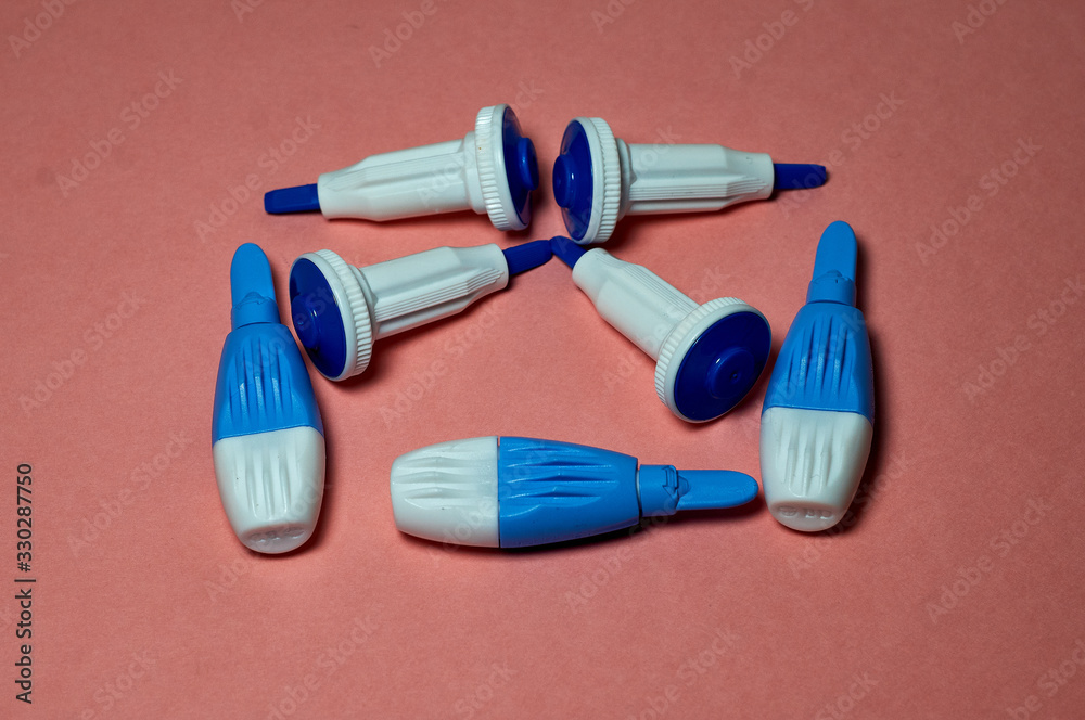 adult blue lancet on a color background. Stock Photo | Adobe Stock