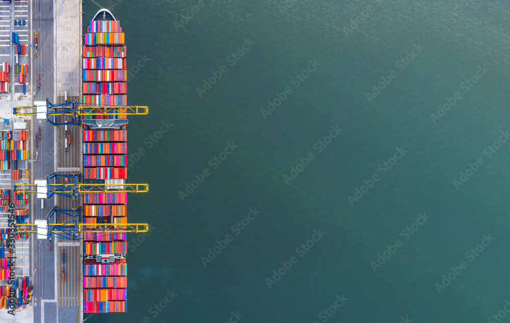 4K, Aerial footage Container ship carrying container box in import export with quay crane ...