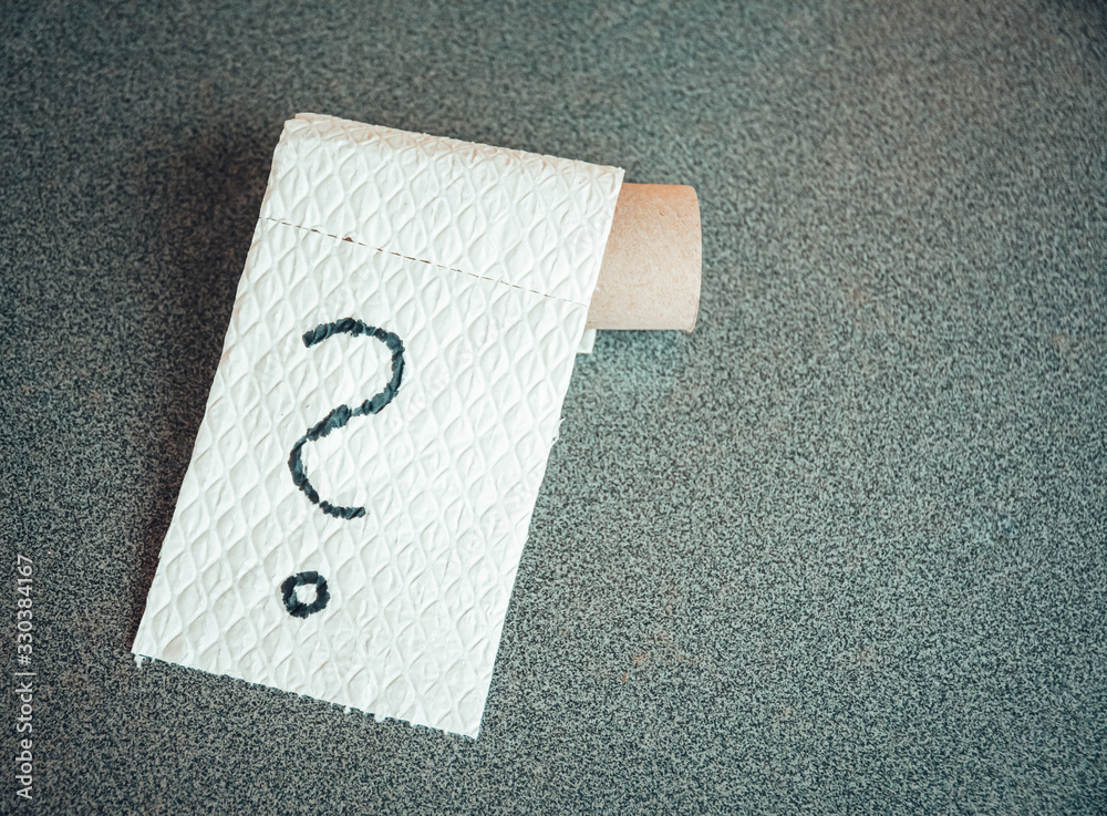 Last piece of toilet paper with question mark Stock Photo | Adobe Stock