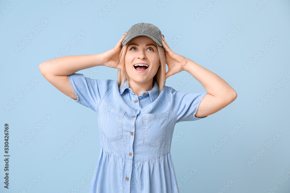 Cool young woman on color background Stock Photo | Adobe Stock