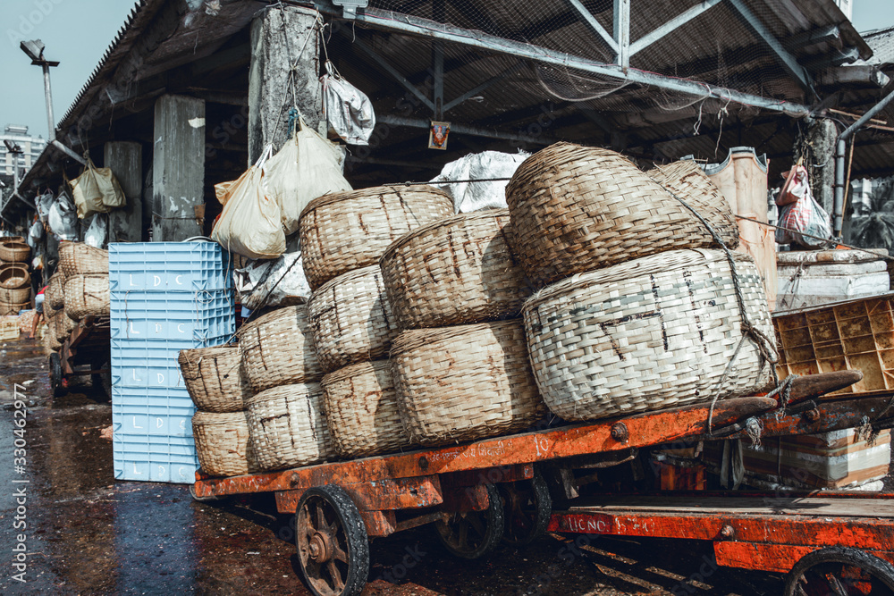 The famous Sassoon Docks Fish Market in Mumbai, India. Piles of round ...