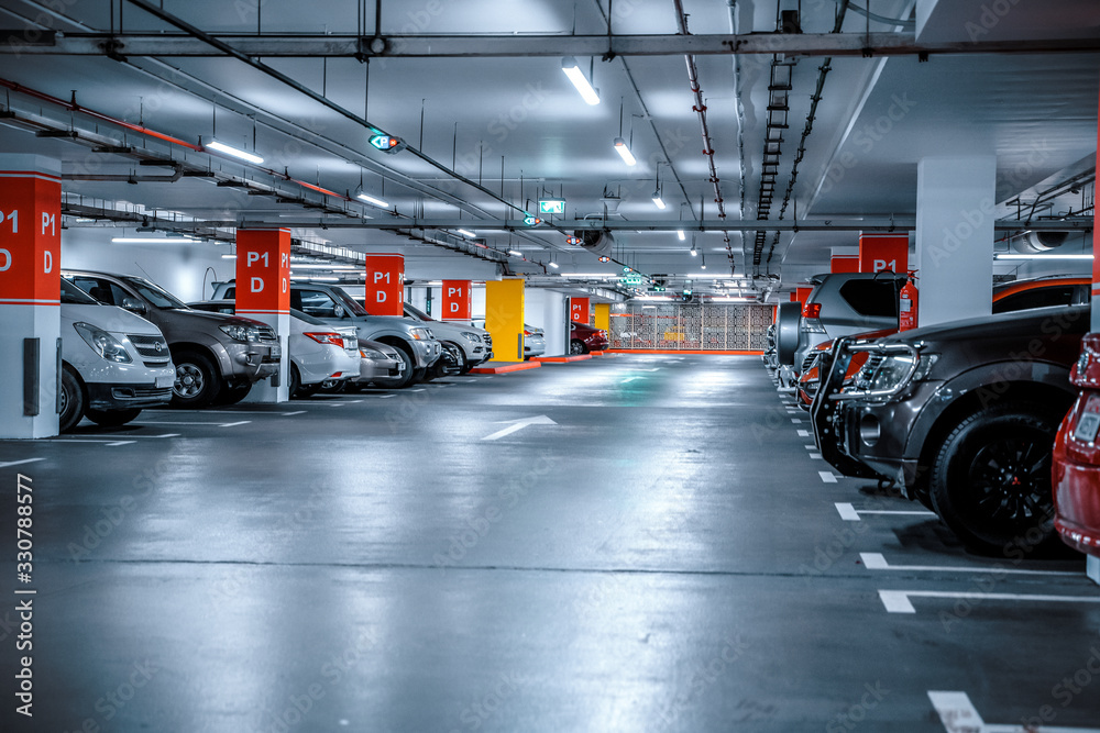 Parking garage - interior shot of multi-story car park, underground ...