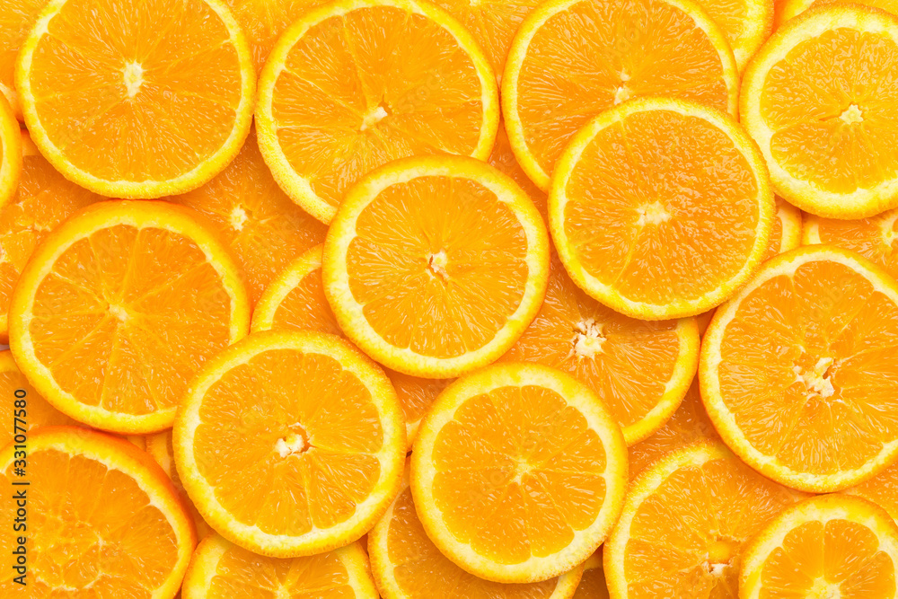 Full frame of fresh orange fruit slices pattern background, close up ...